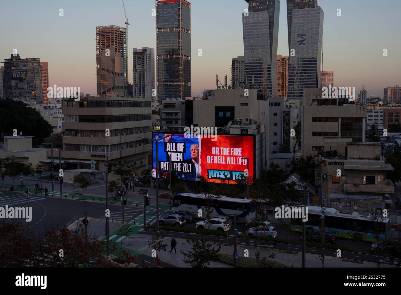 An electronic billboard beams an image of President-elect Donald Trump ...
