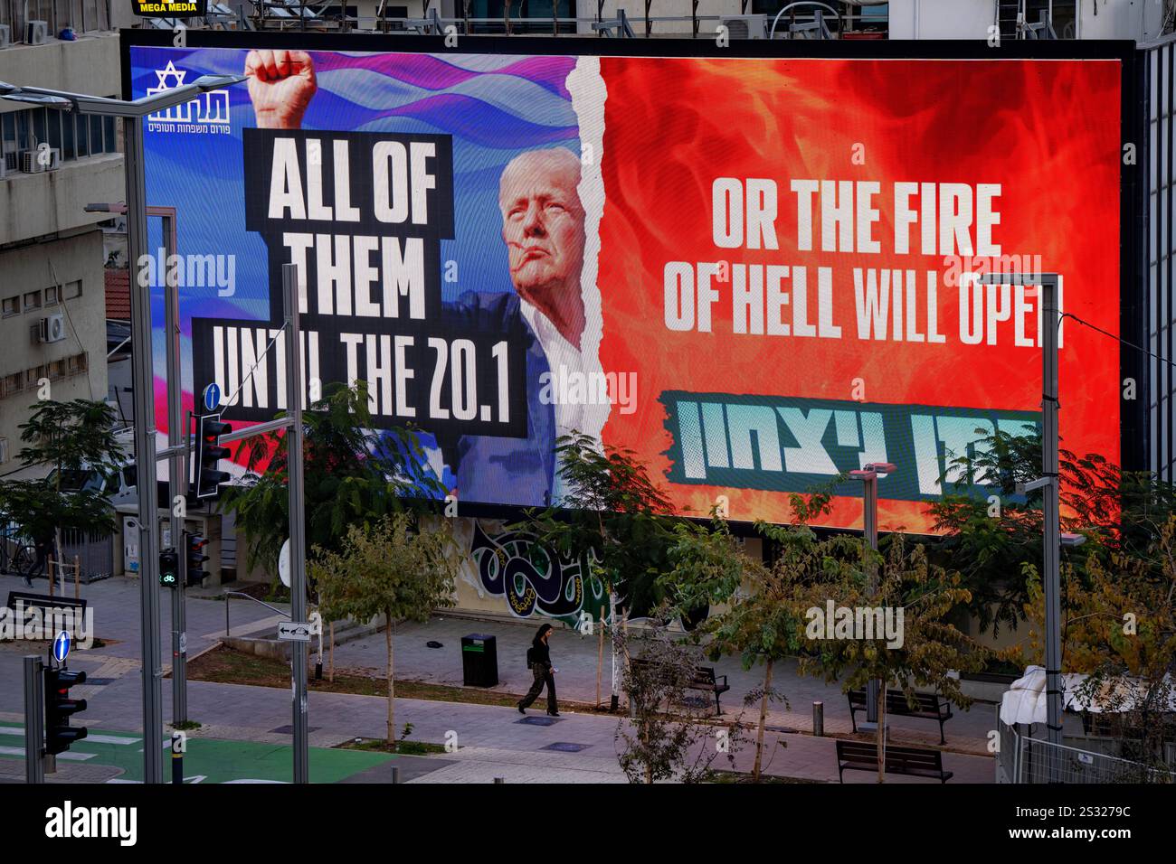 An electronic billboard beams an image of President-elect Donald Trump ...