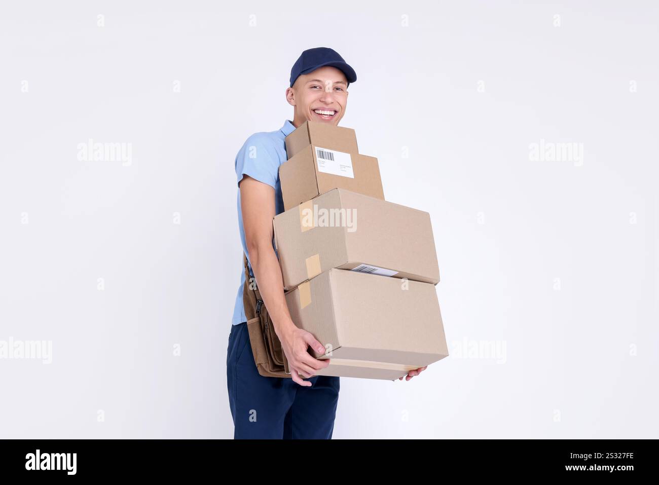 Happy postman with parcels on white background Stock Photo - Alamy