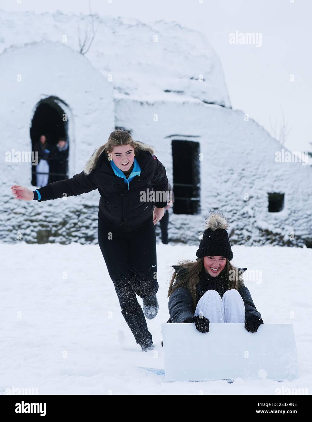 Faye Tierney, from Templeogue, gets a push from her friend Nessa ...