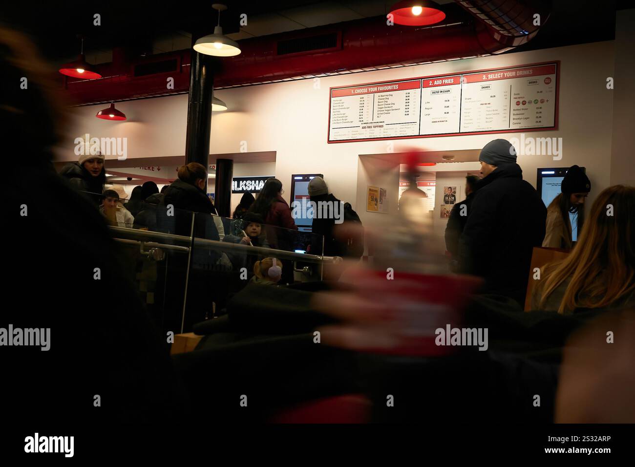 Menu at the Five Guys restaurant, Charing Cross, London, England Stock ...