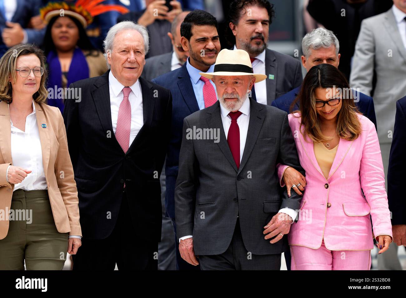 Brazilian President Luiz Inacio Lula da Silva, with a hat, and his wife ...