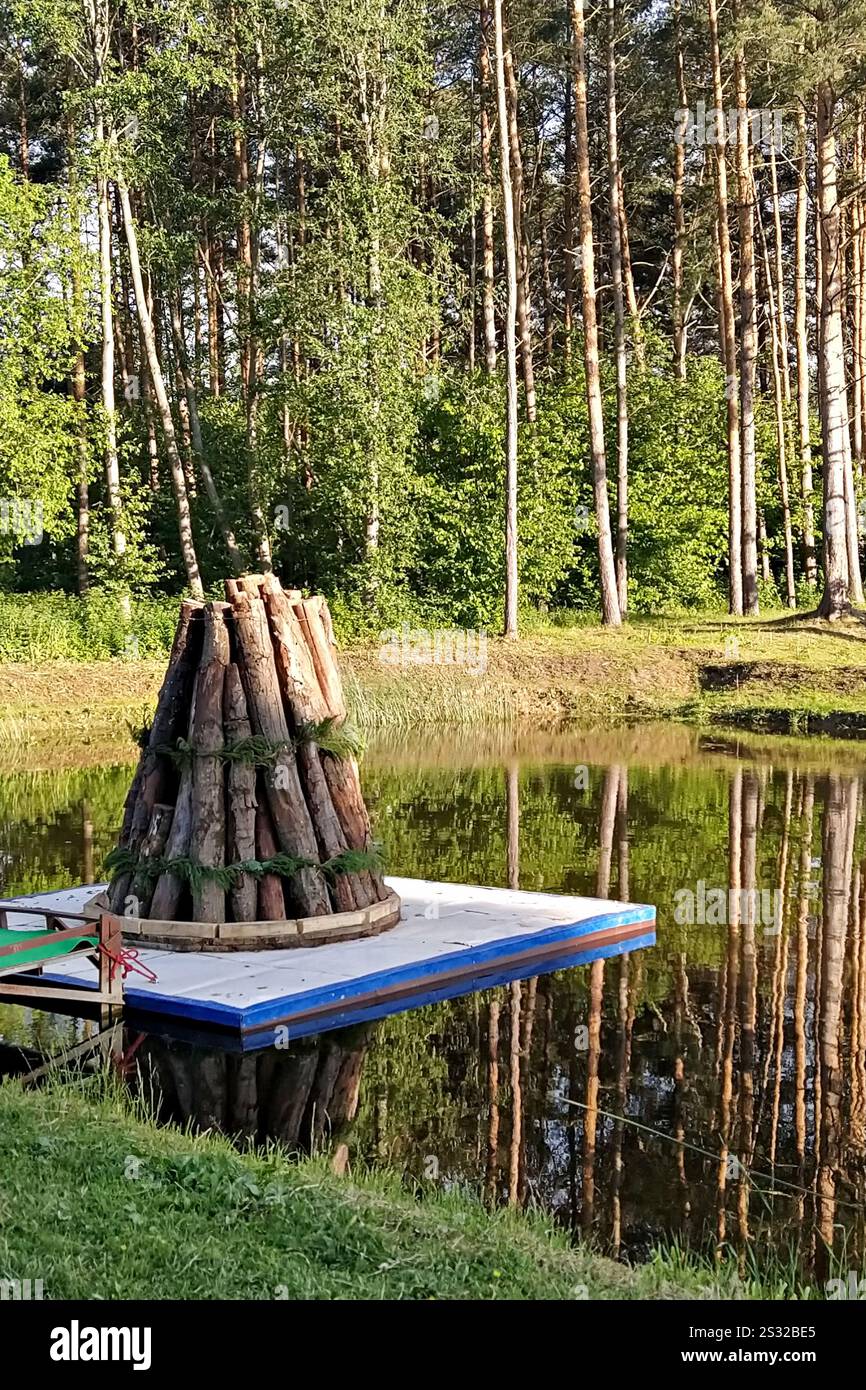 Traditional Bonfire Structure on a Floating Platform in a Forest ...