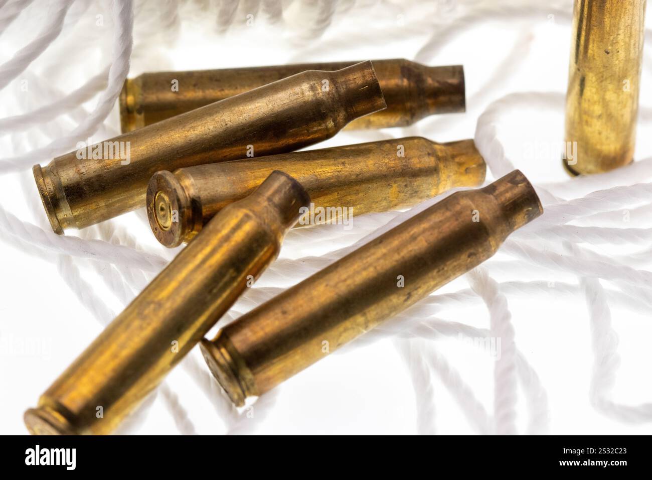 shoot casing .223 shells string and white background . High quality ...