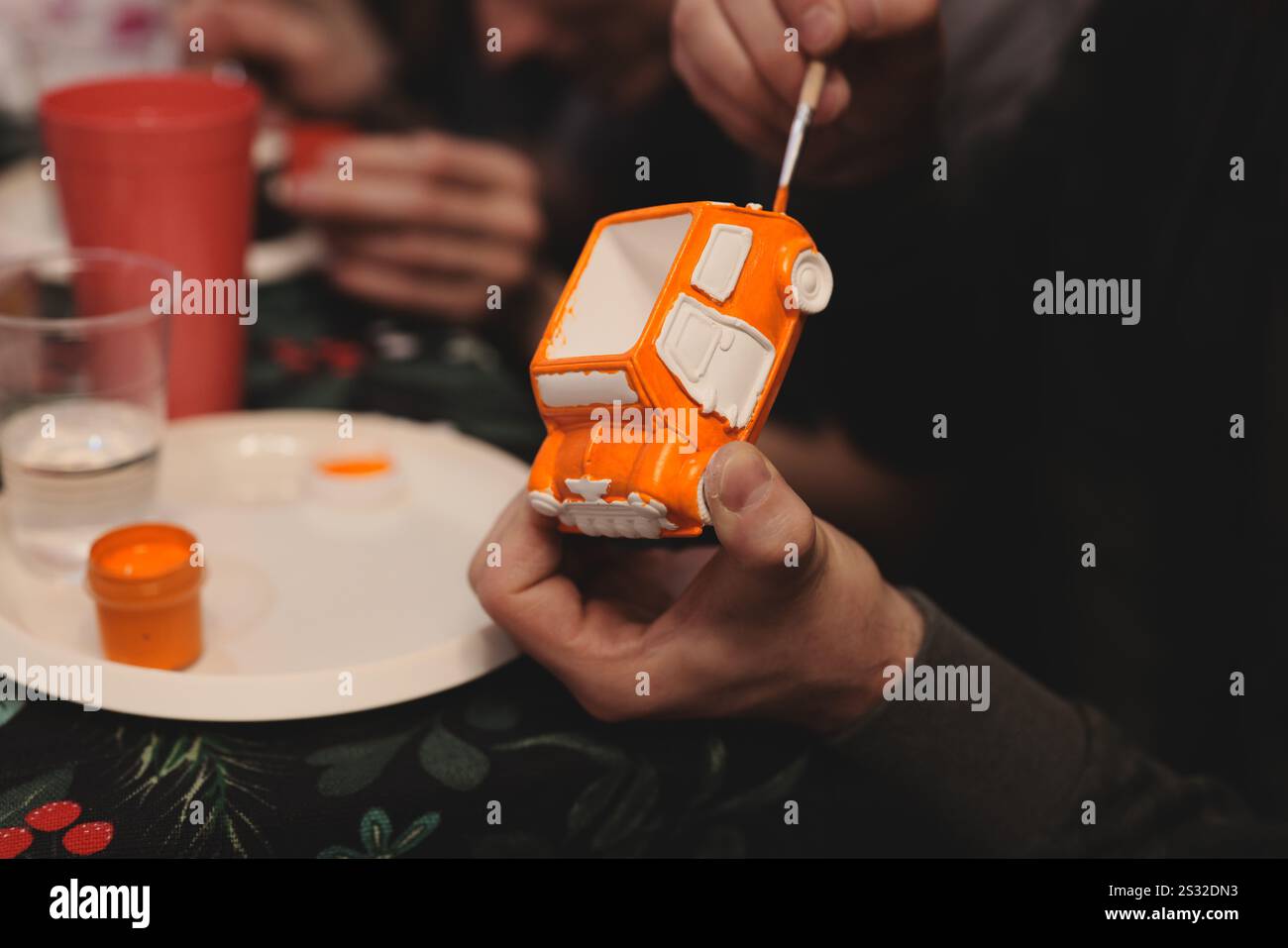 Engaging in a delightful and creative orange craft project within a ...