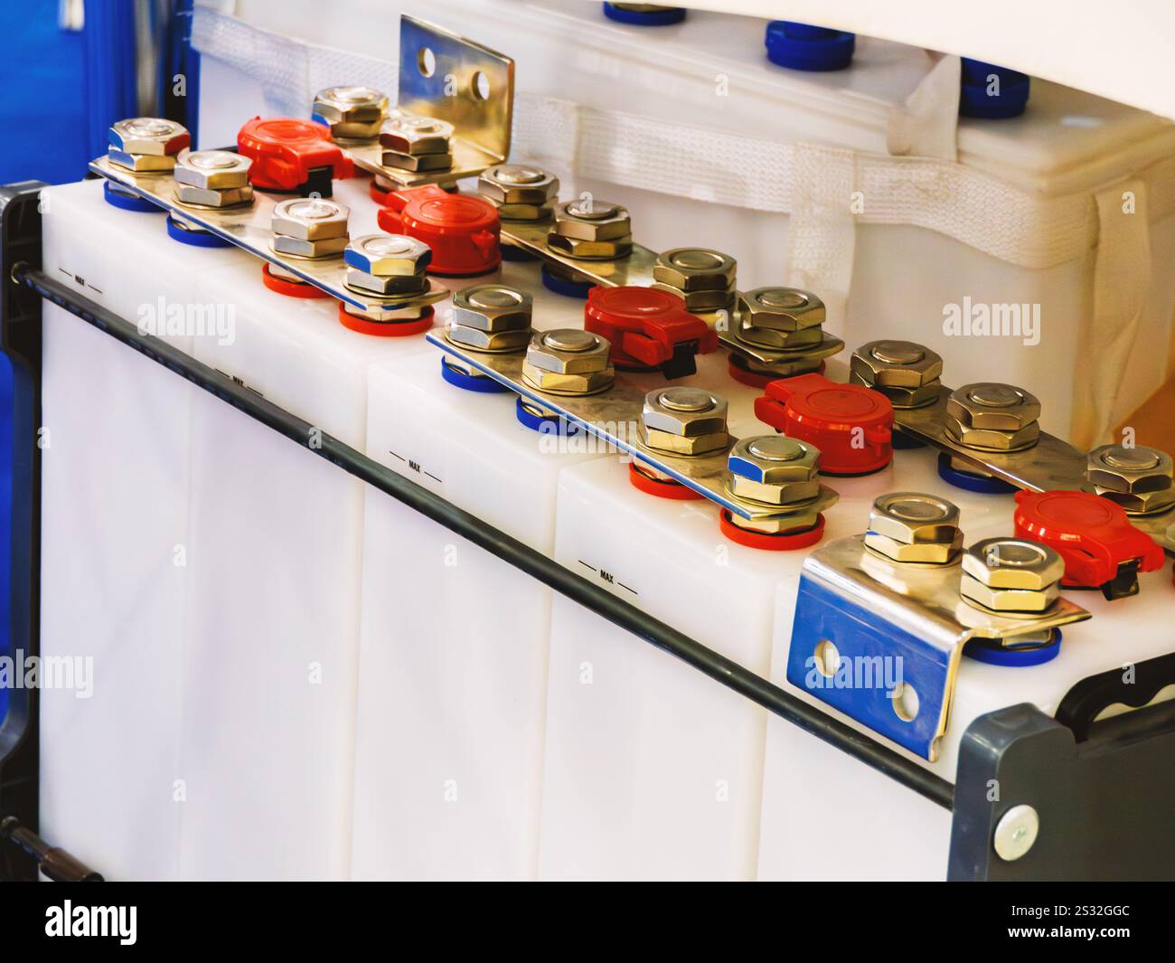 Several batteries are connected to each other by metal plates Stock ...