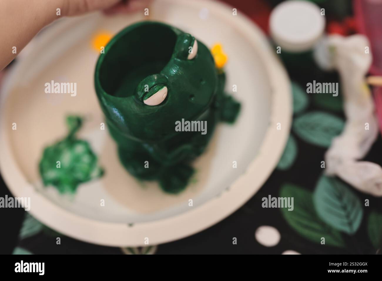 Currently engaging in the delightful activity of Creative Frog Mug ...