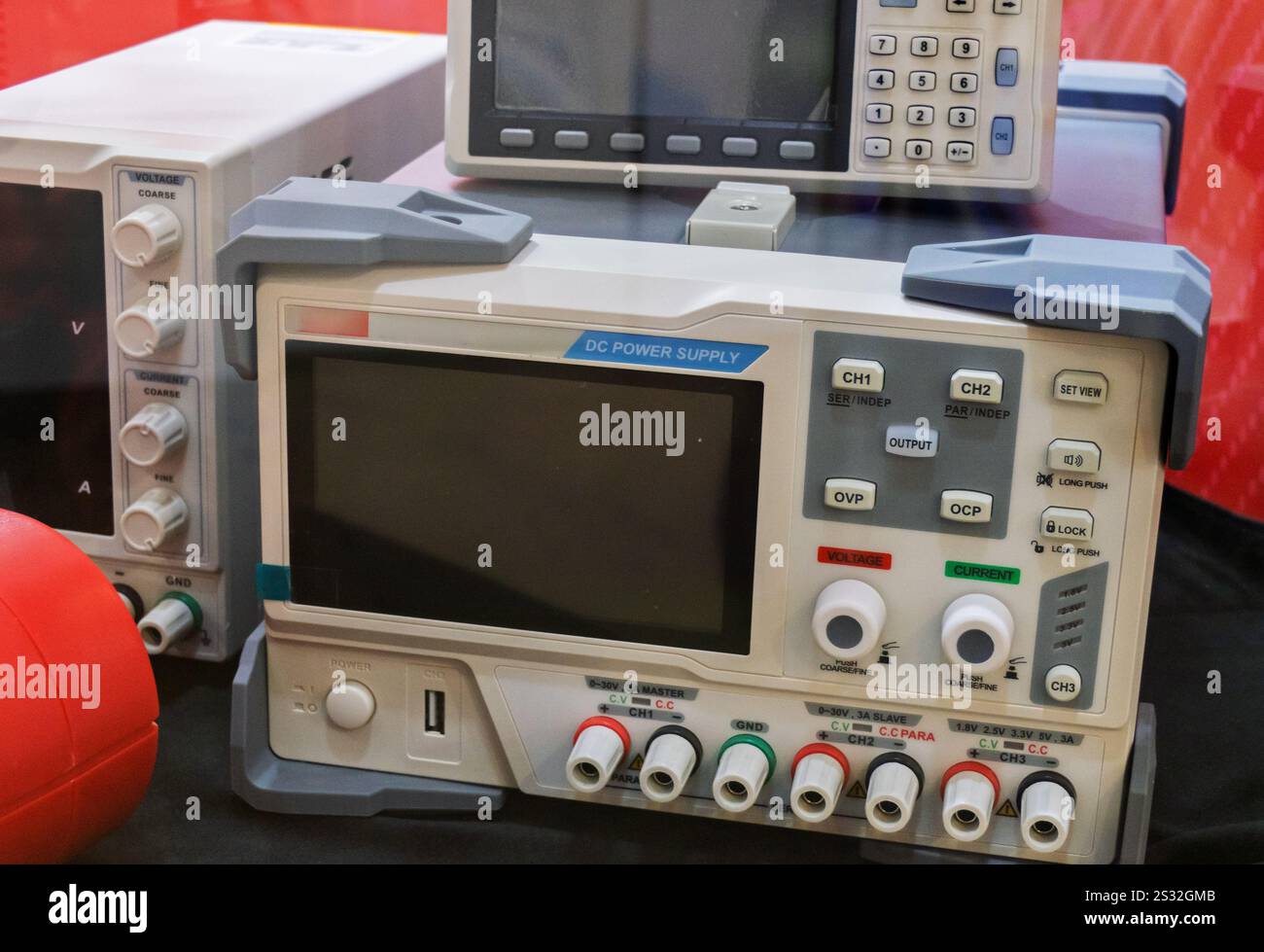 Laboratory 3-channel power supply, with voltage regulation Stock Photo ...