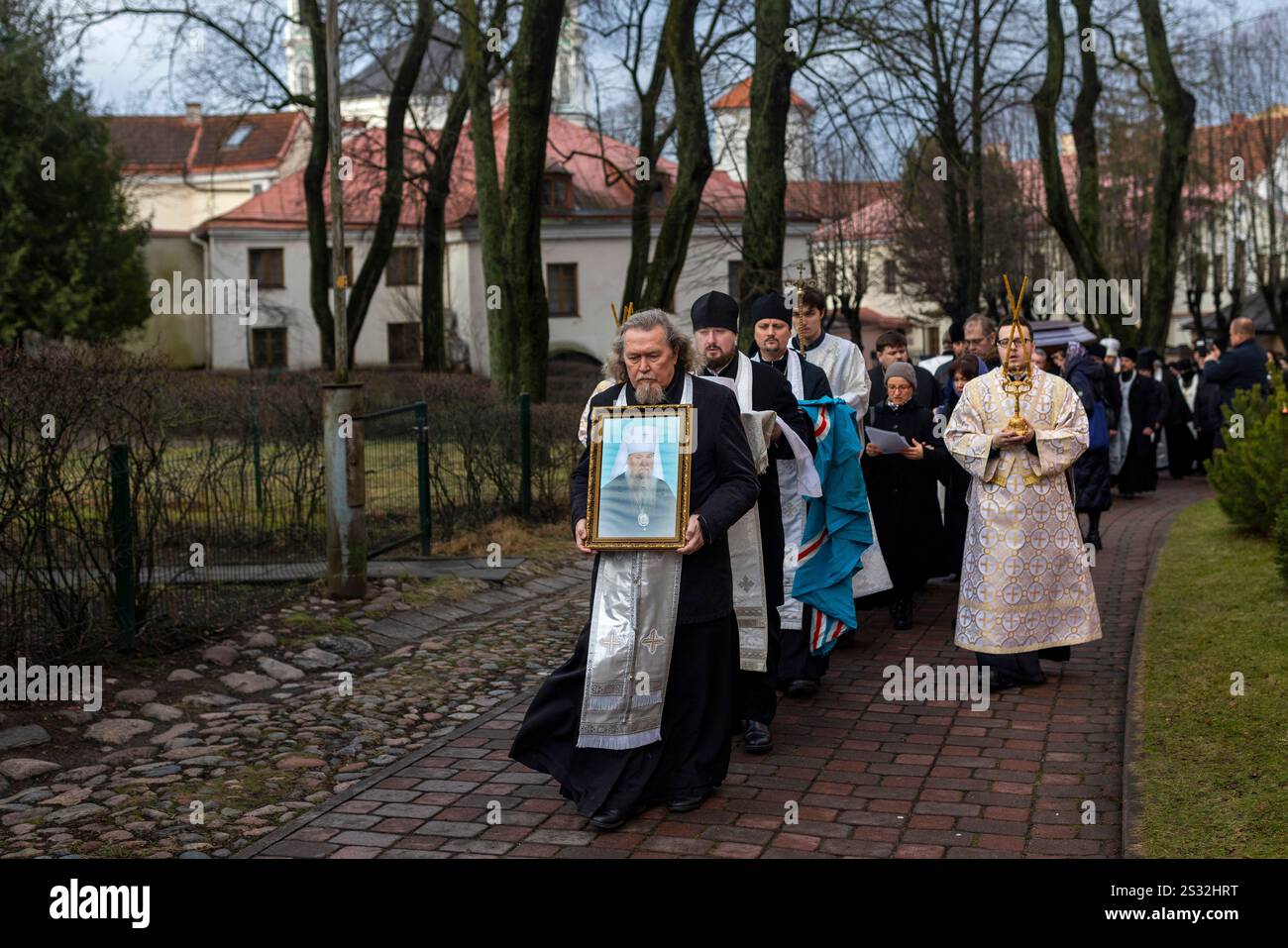 Orthodox priests lead a funeral procession during the funeral ceremony ...