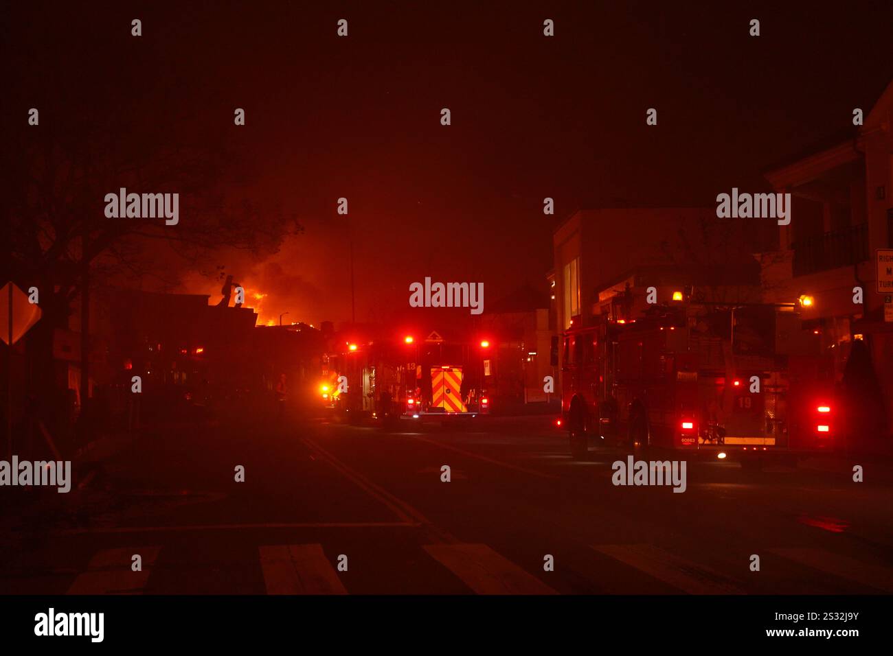 Fire trucks are seen at the scene. The wildfire in Pacific Palisades ...