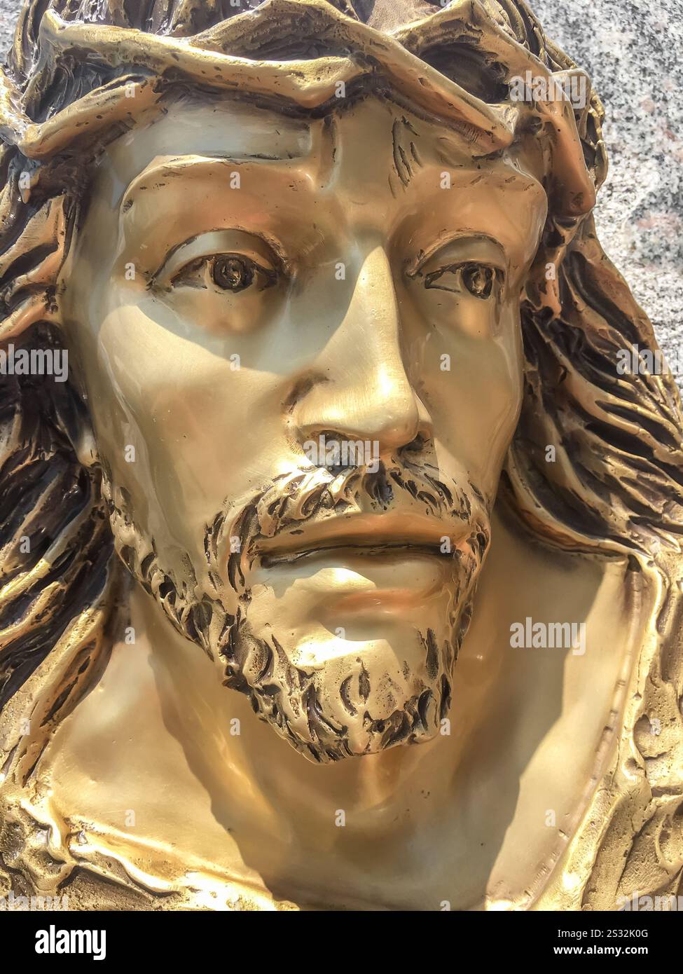 Bronze statue of the face of jesus. Ancient sculpture. Ideal for concepts or events like Easter ...