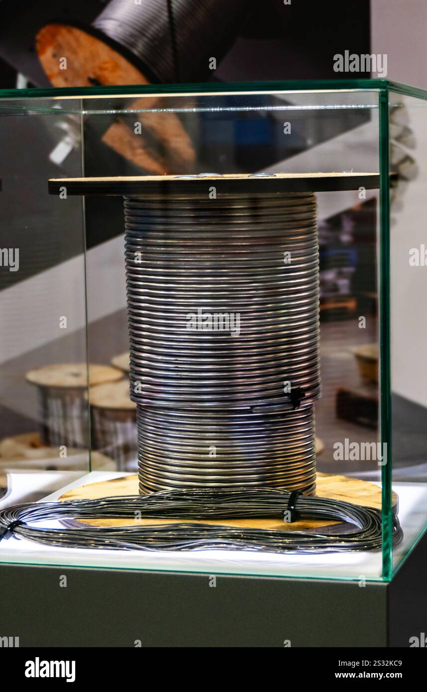 Lead wire wound on a wooden bobbin Stock Photo - Alamy