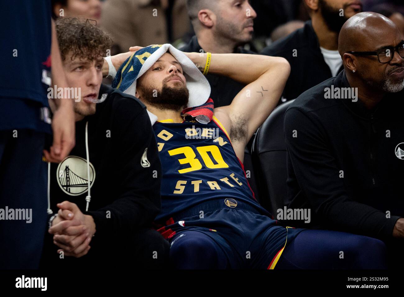 Golden State Warriors guard Stephen Curry (30) is seen on the bench ...