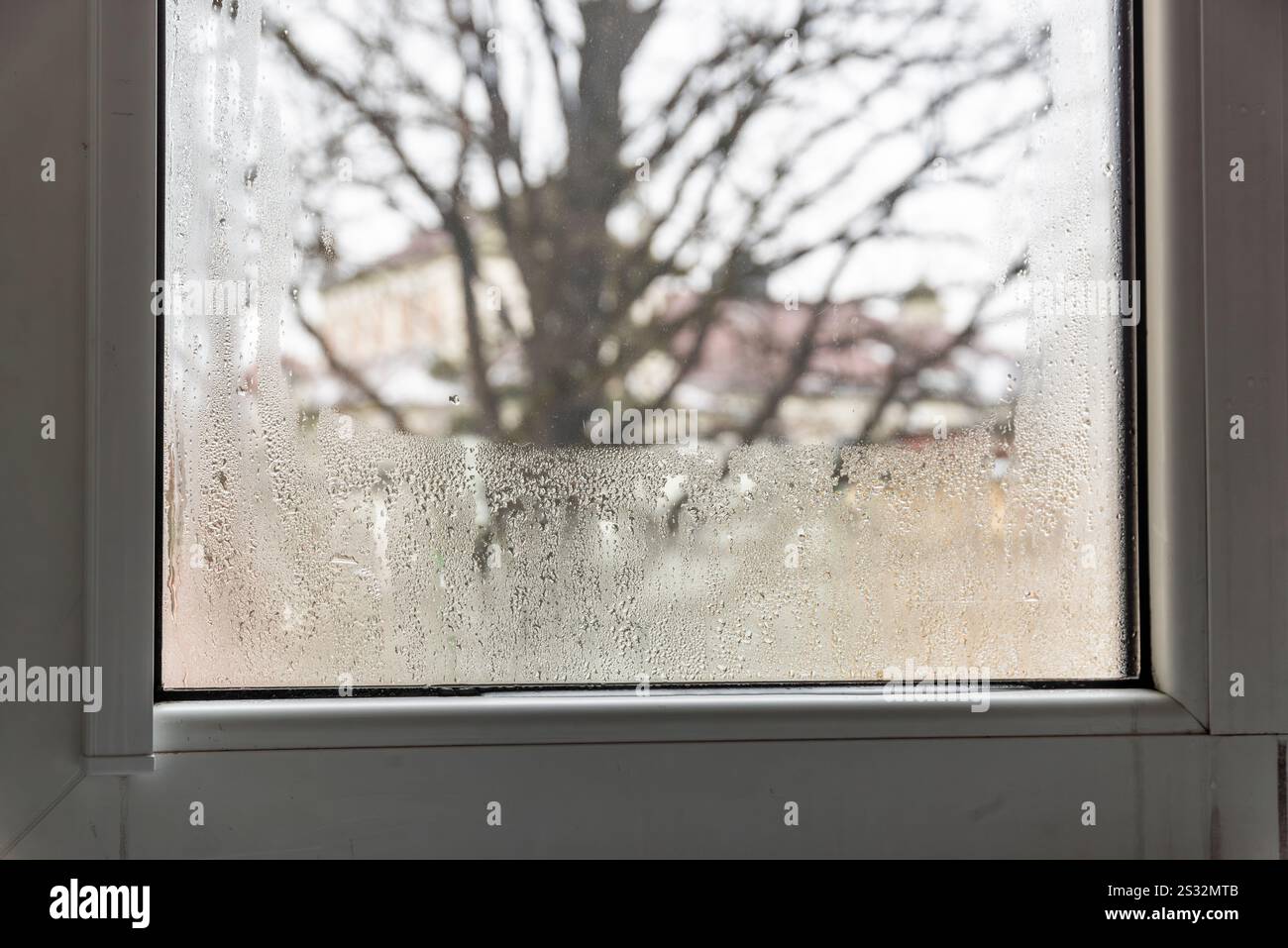 Steamy window in the apartment due to moisture and poor ventilation ...