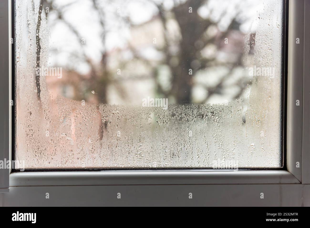 Steamy window in the apartment due to moisture and poor ventilation ...