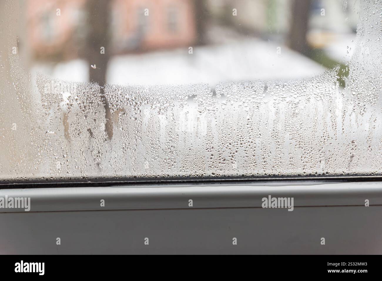 Steamy window in the apartment due to moisture and poor ventilation ...