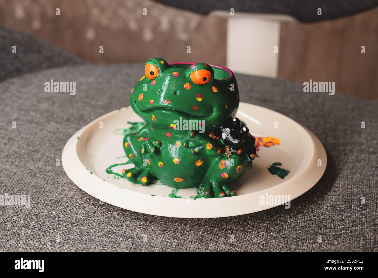 An EyeCatching and Colorful Ceramic Frog Sculpture Featuring a Unique ...