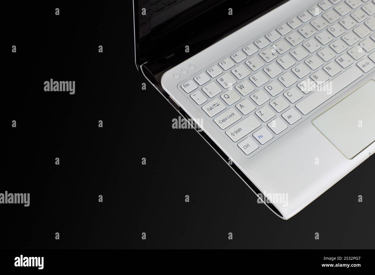 Minimalist White Laptop Keyboard on Black Background Stock Photo - Alamy