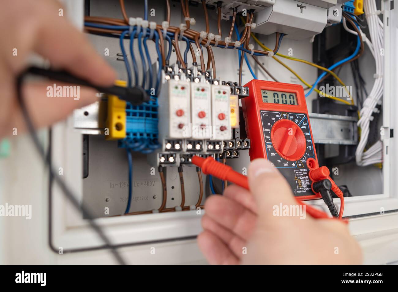 Hands Testing Electrical Circuits with Multimeter Stock Photo - Alamy
