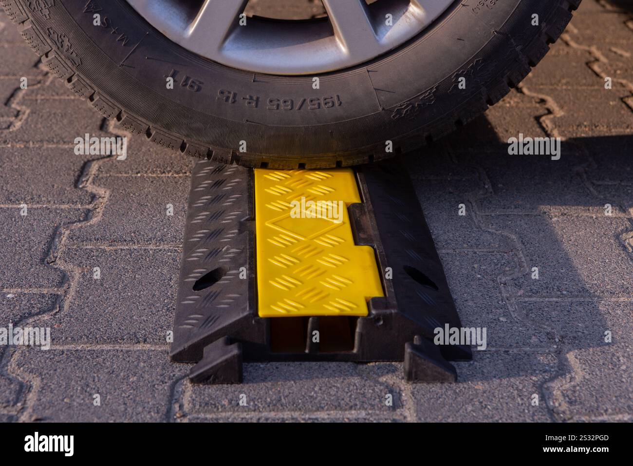 Car Wheel Crossing Cable Protector Ramp Stock Photo - Alamy