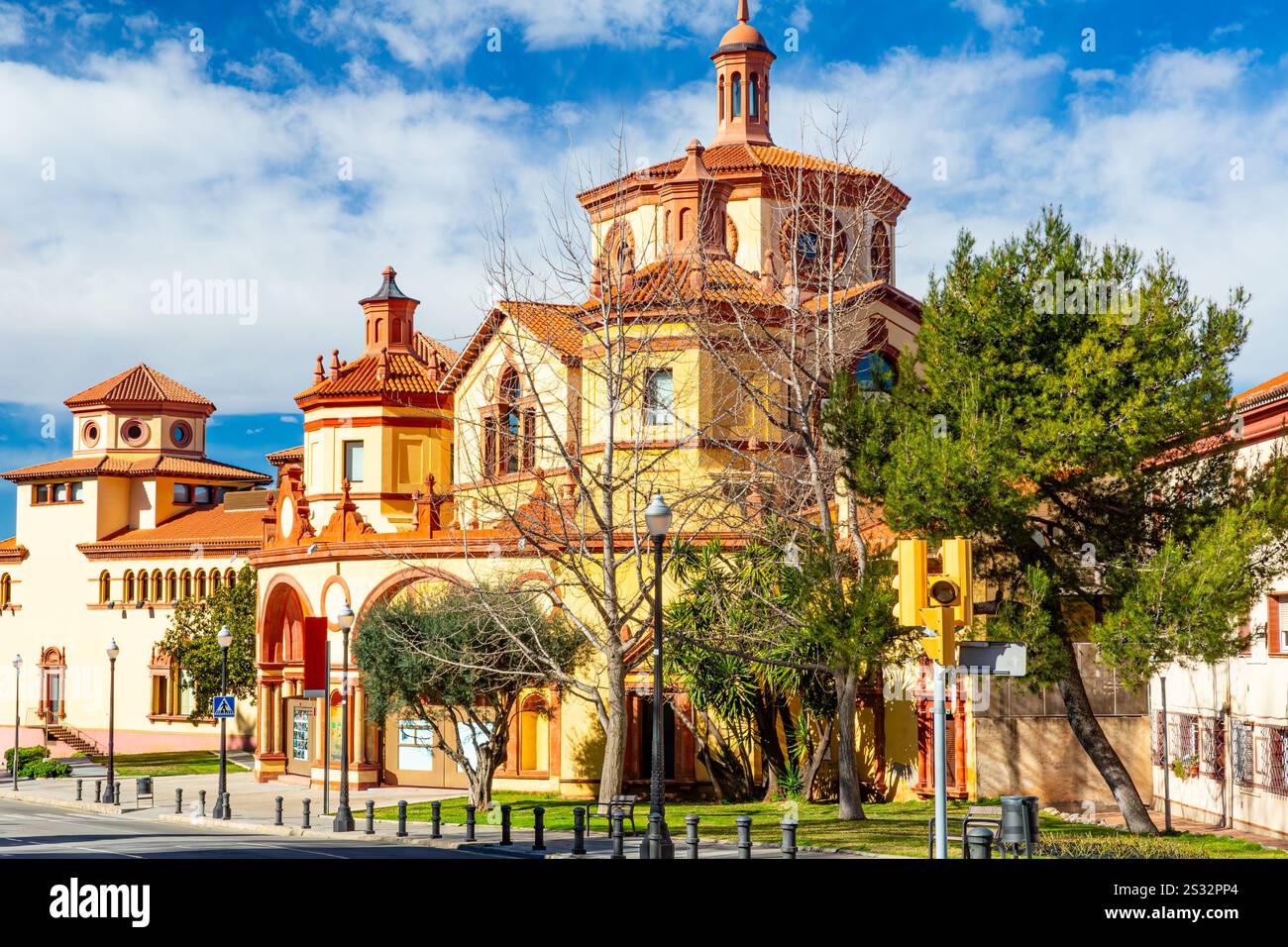 Colonial public building, tiled roof towers, variety of different ...