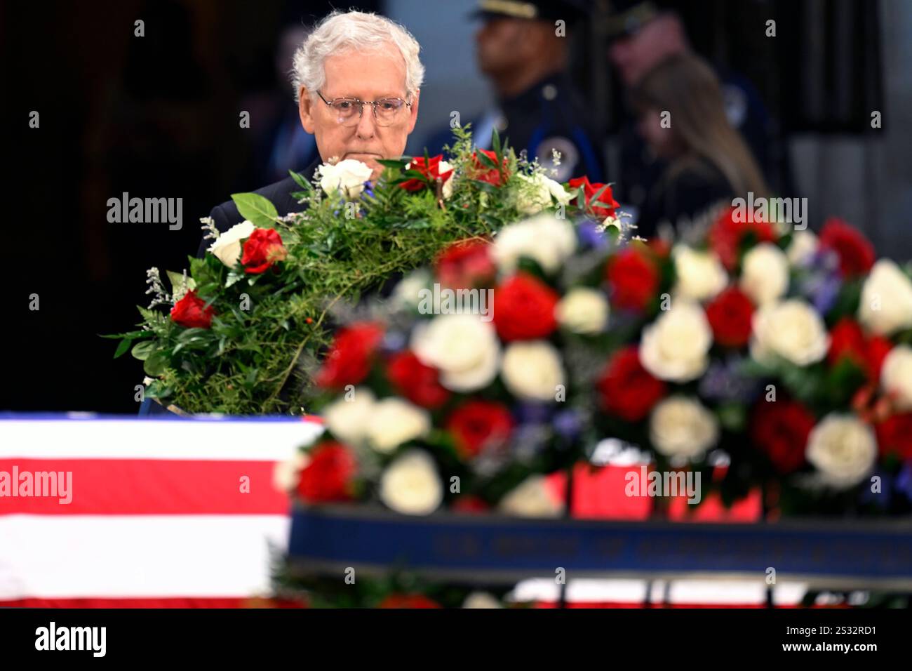 Sen. Mitch McConnell, R-Ky., visits the flag draped casket to pay ...