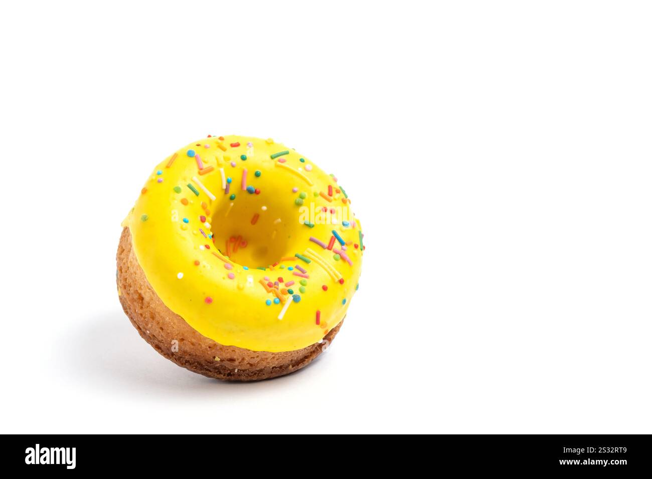 Donut with yellow icing isolated on white background Stock Photo - Alamy