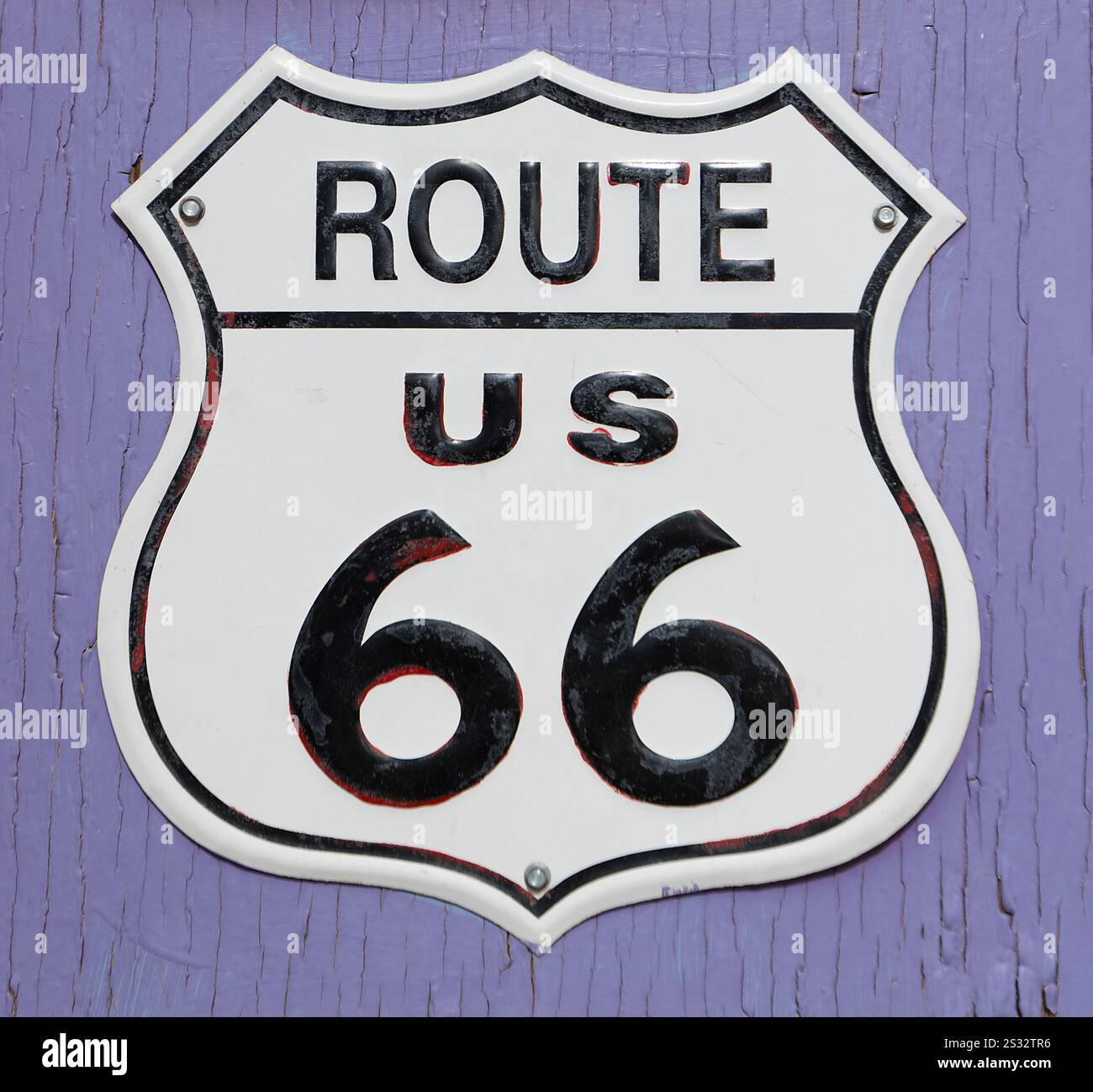Route 66 symbol in lilac on a facade-usa Stock Photo - Alamy