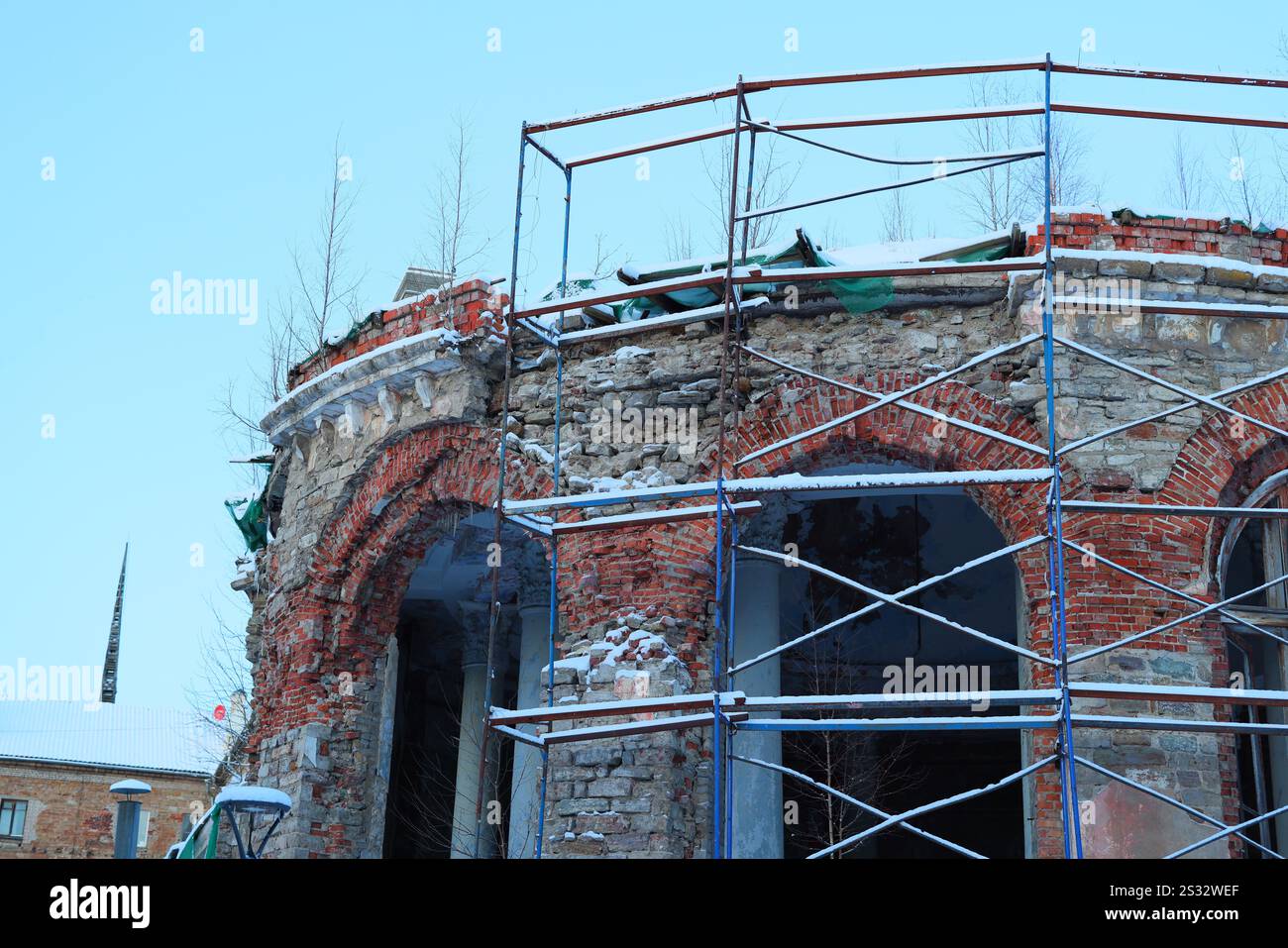 The restoration work of a historic brick building is currently underway ...