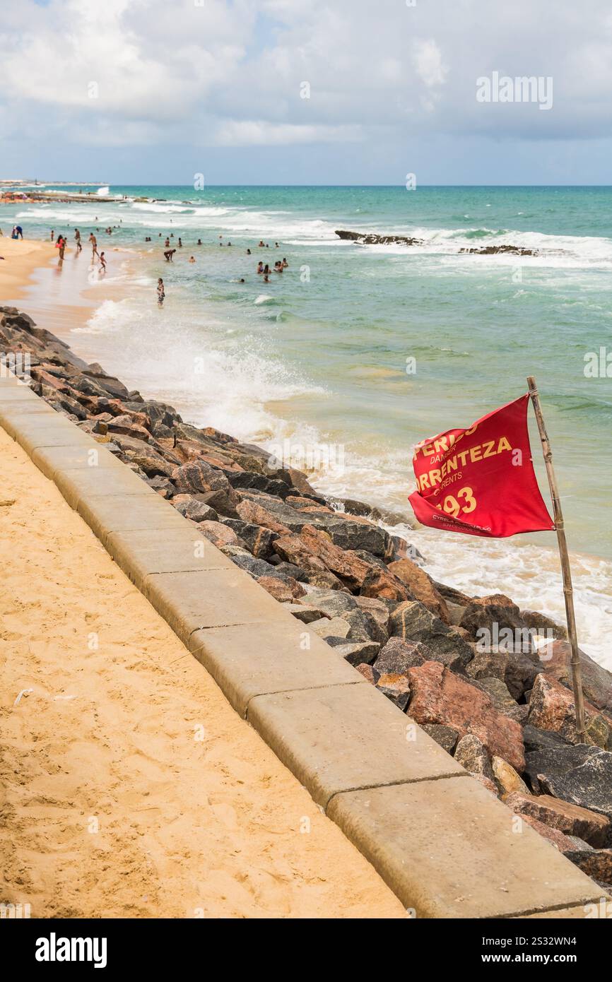 Red flag flying on Praia do Meio, Natal, Brazil Stock Photo - Alamy