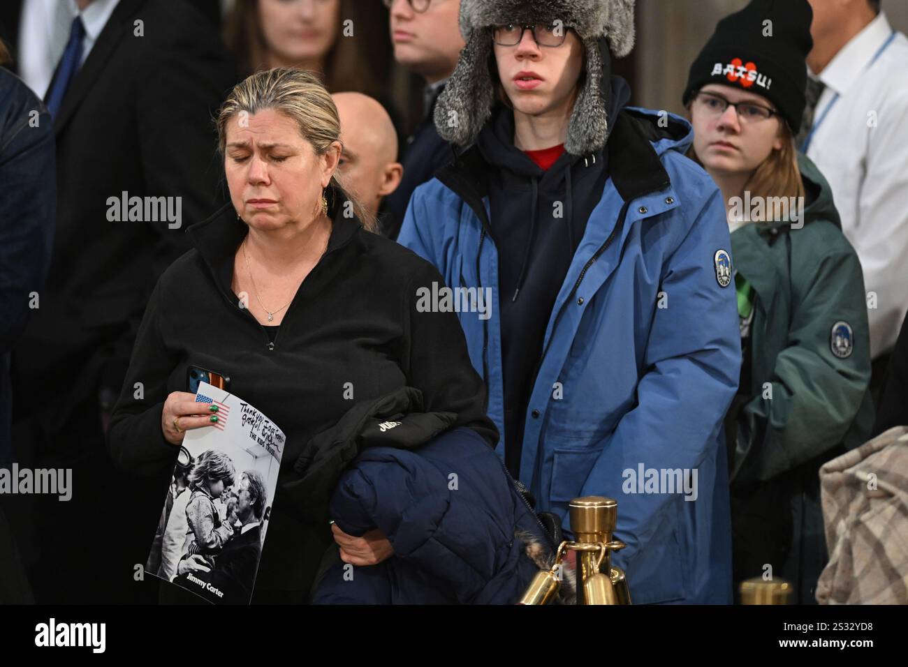 Members of the general public pause at the casket of the late former ...