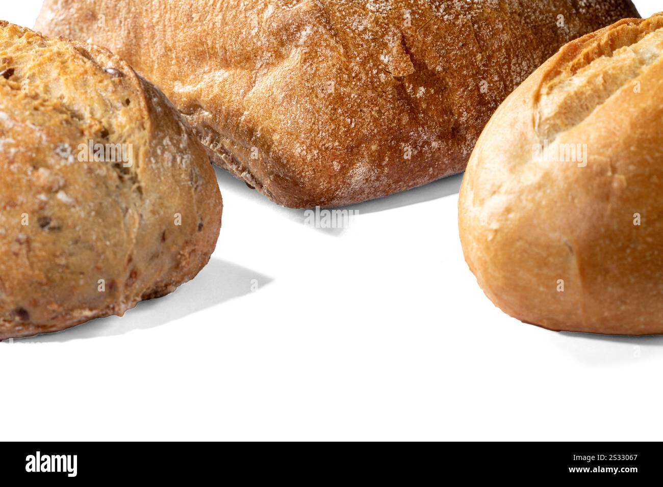 Three loaves of bread on a white background Stock Photo - Alamy