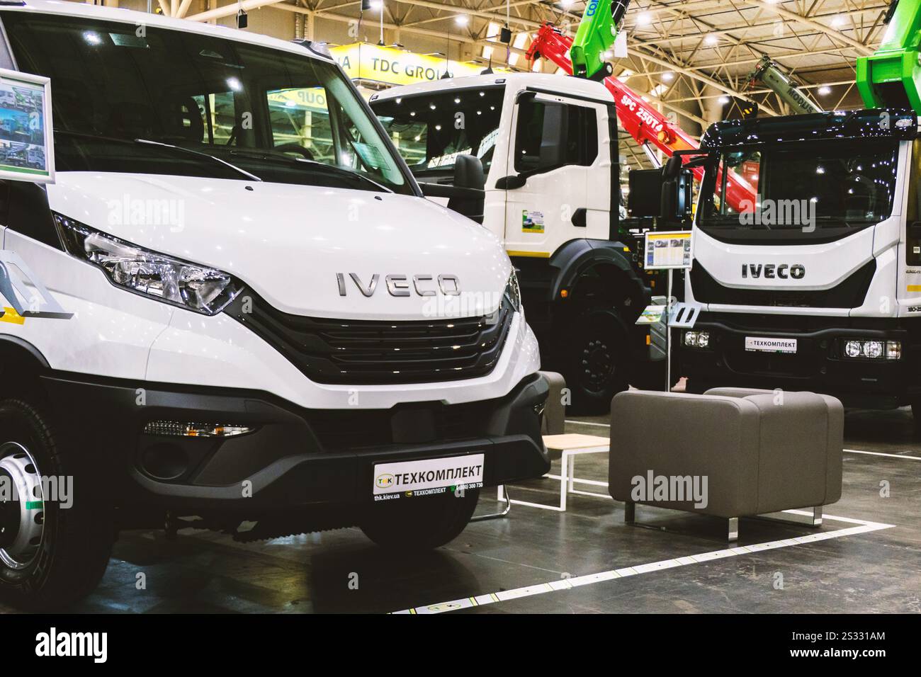 IVECO commercial vehicles. White IVECO Daily van. On both sides of it ...