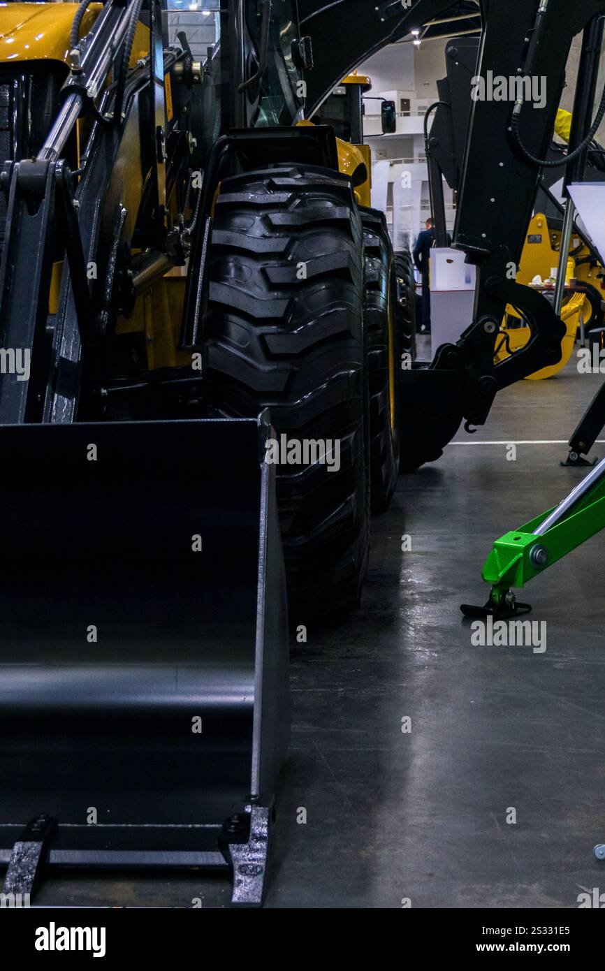 Part of a front loader, a type of heavy construction equipment. The ...