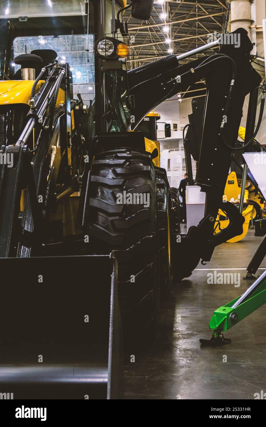 Part of a front loader, a type of heavy construction equipment. The ...