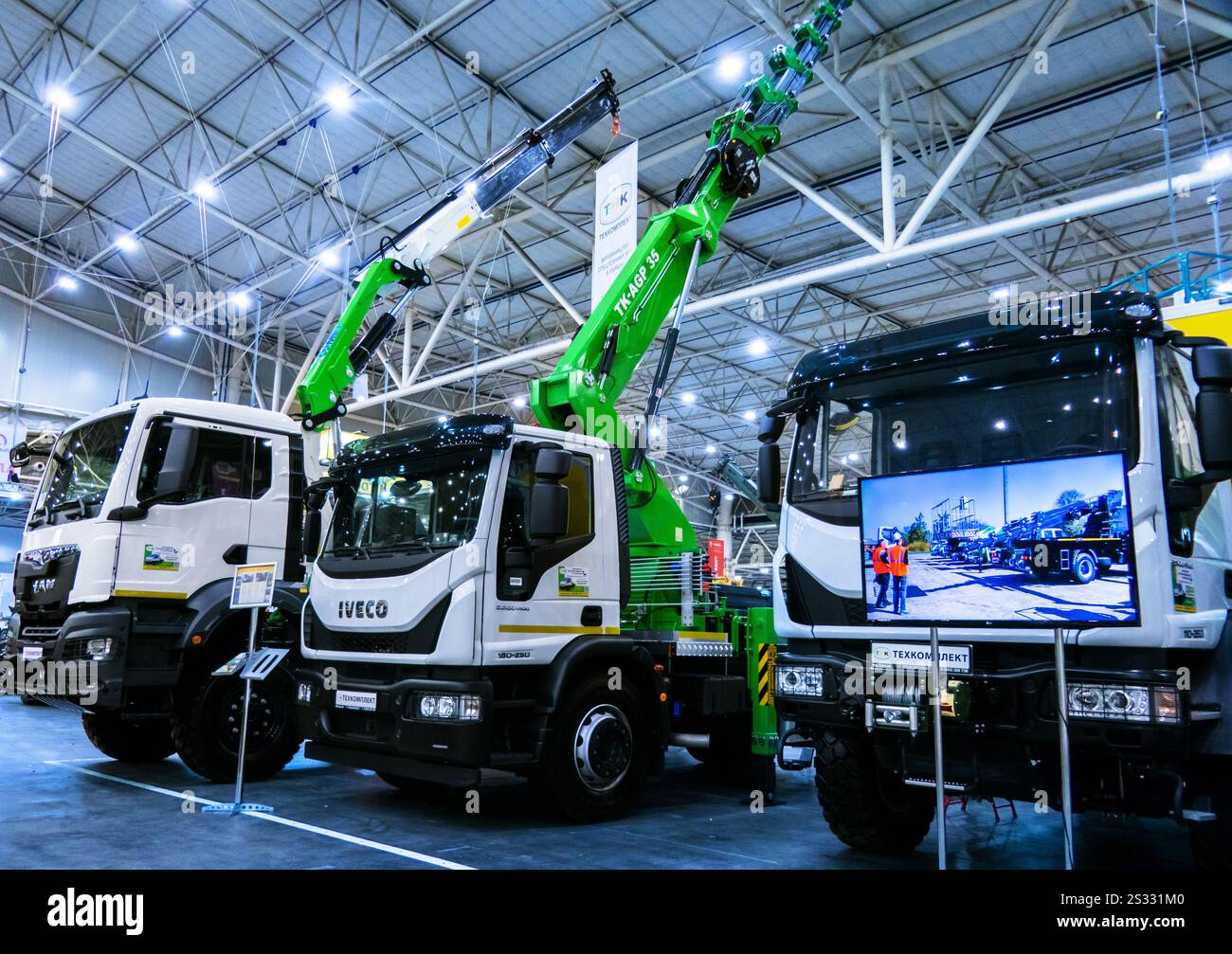 Kyiv, Ukraine - October 16, 2024: Two modern IVECO commercial trucks ...