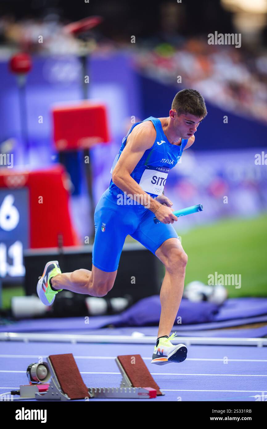 Luca Sito participating in the 4X400 meters relay at the Paris 2024 ...