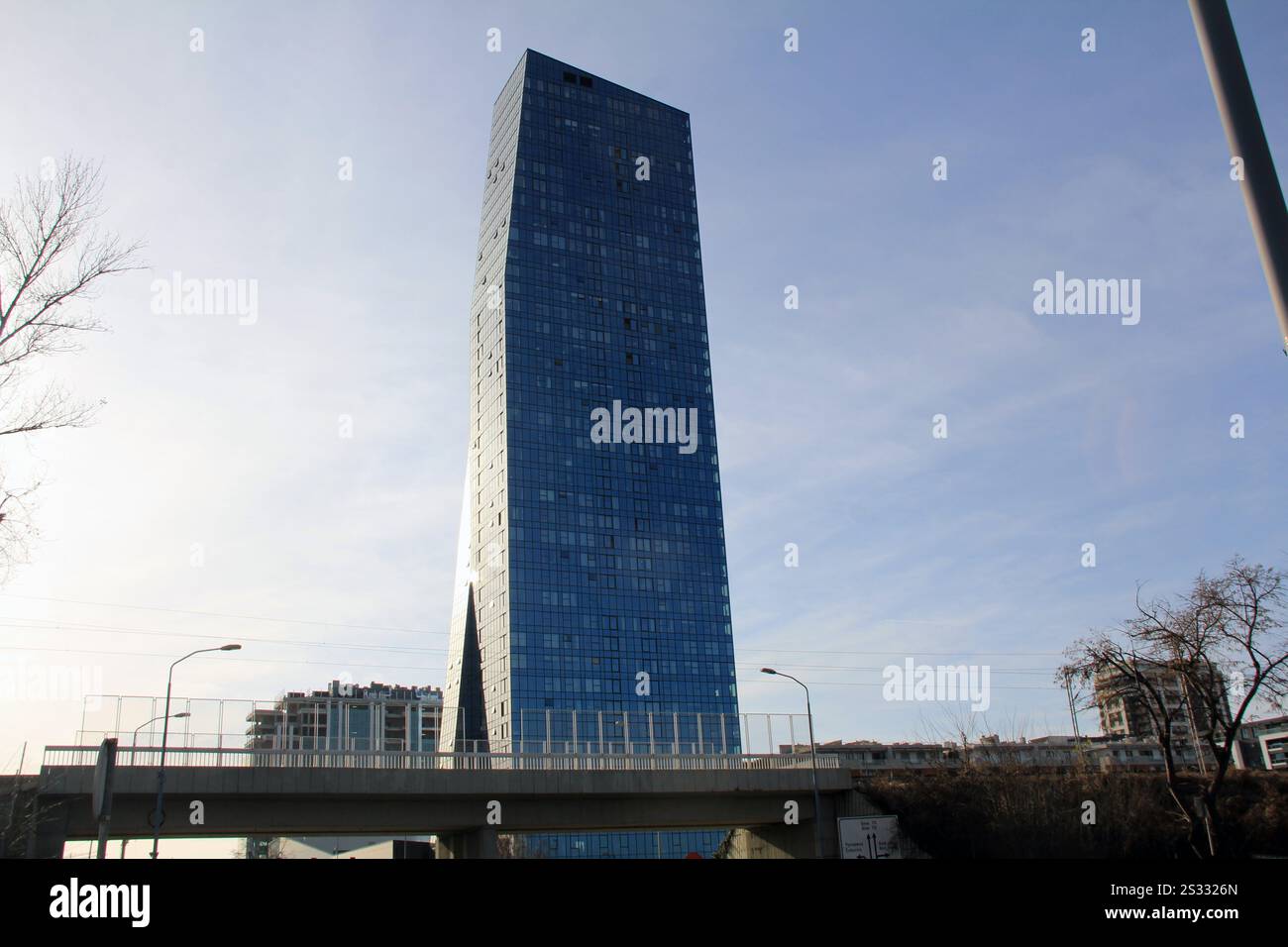 a contemporary building with a glass facade in New Belgrade. the ...
