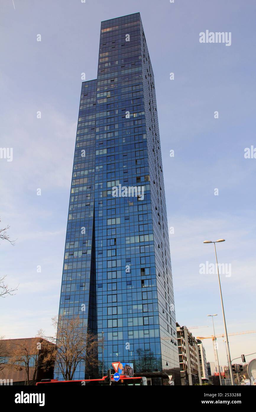 a contemporary building with a glass facade in New Belgrade. the ...