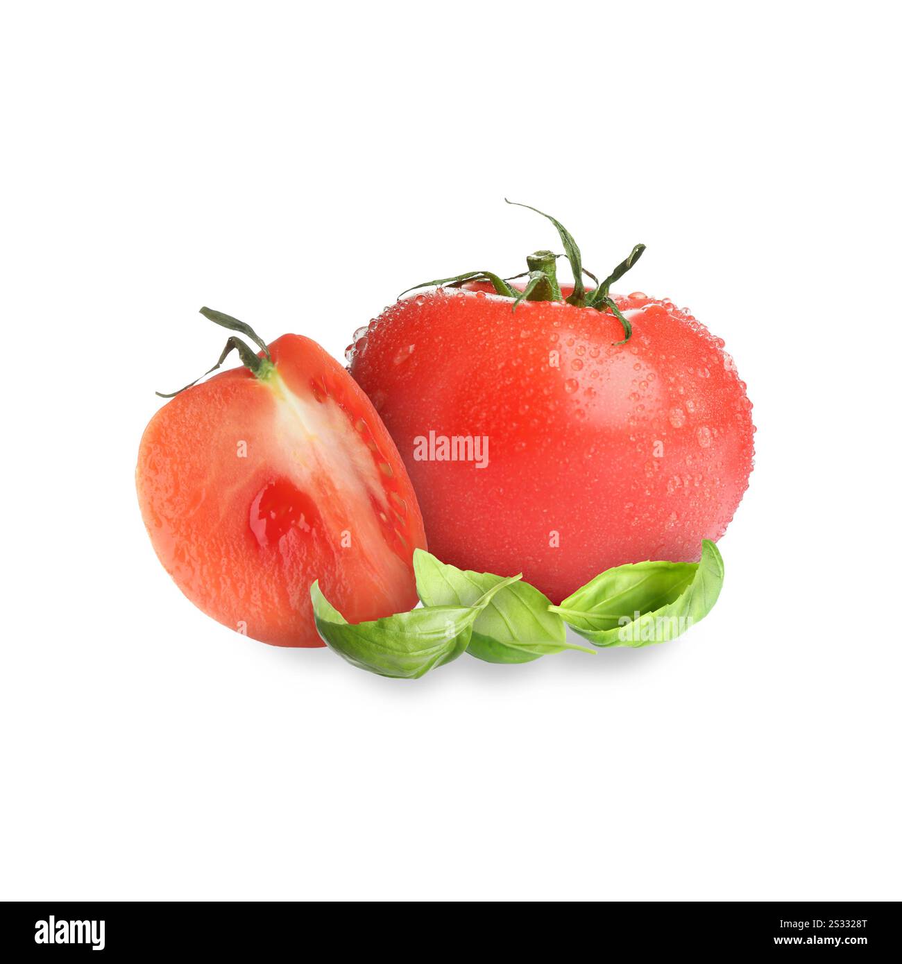 Fresh raw tomatoes and aromatic basil leaves isolated on white Stock ...