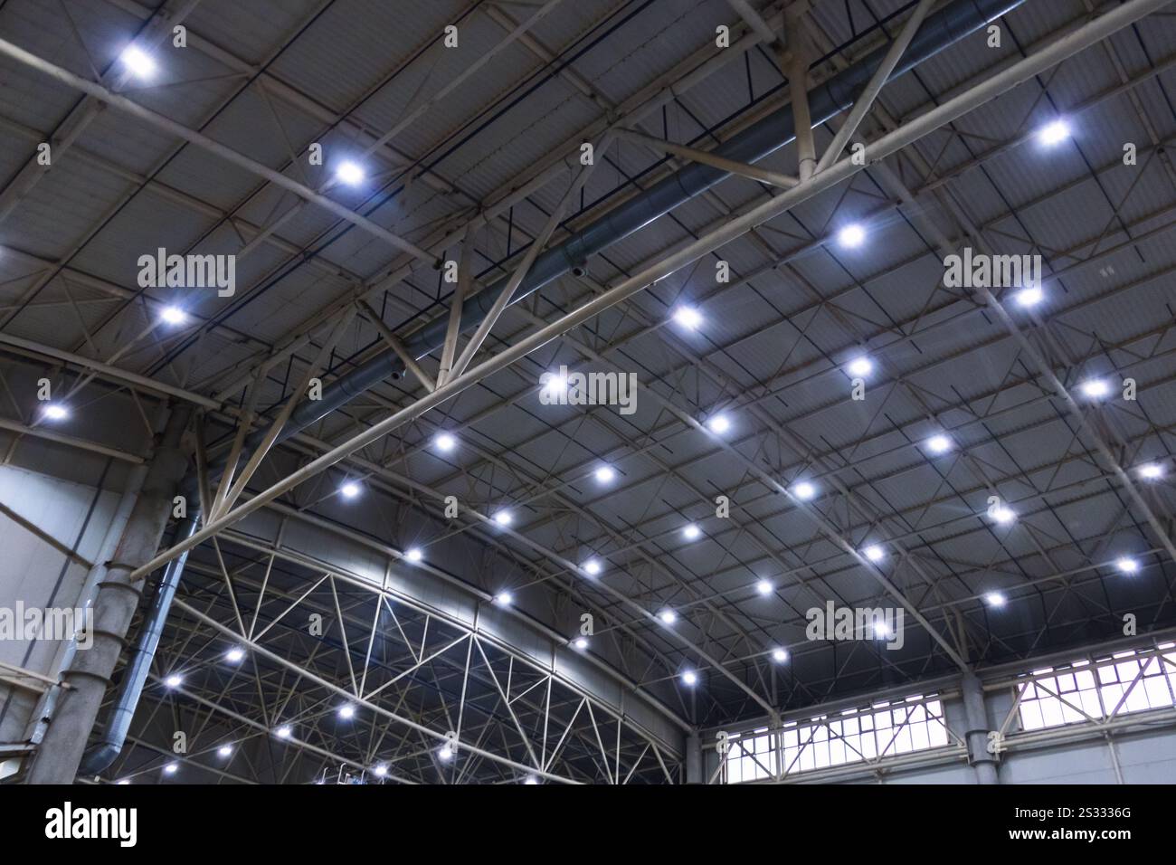 The metal roof structure of a large building, likely an industrial hall ...