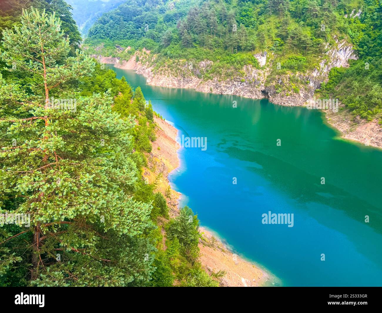 Valvestino lake from Recchi bridge on summer day, Italy Stock Photo - Alamy