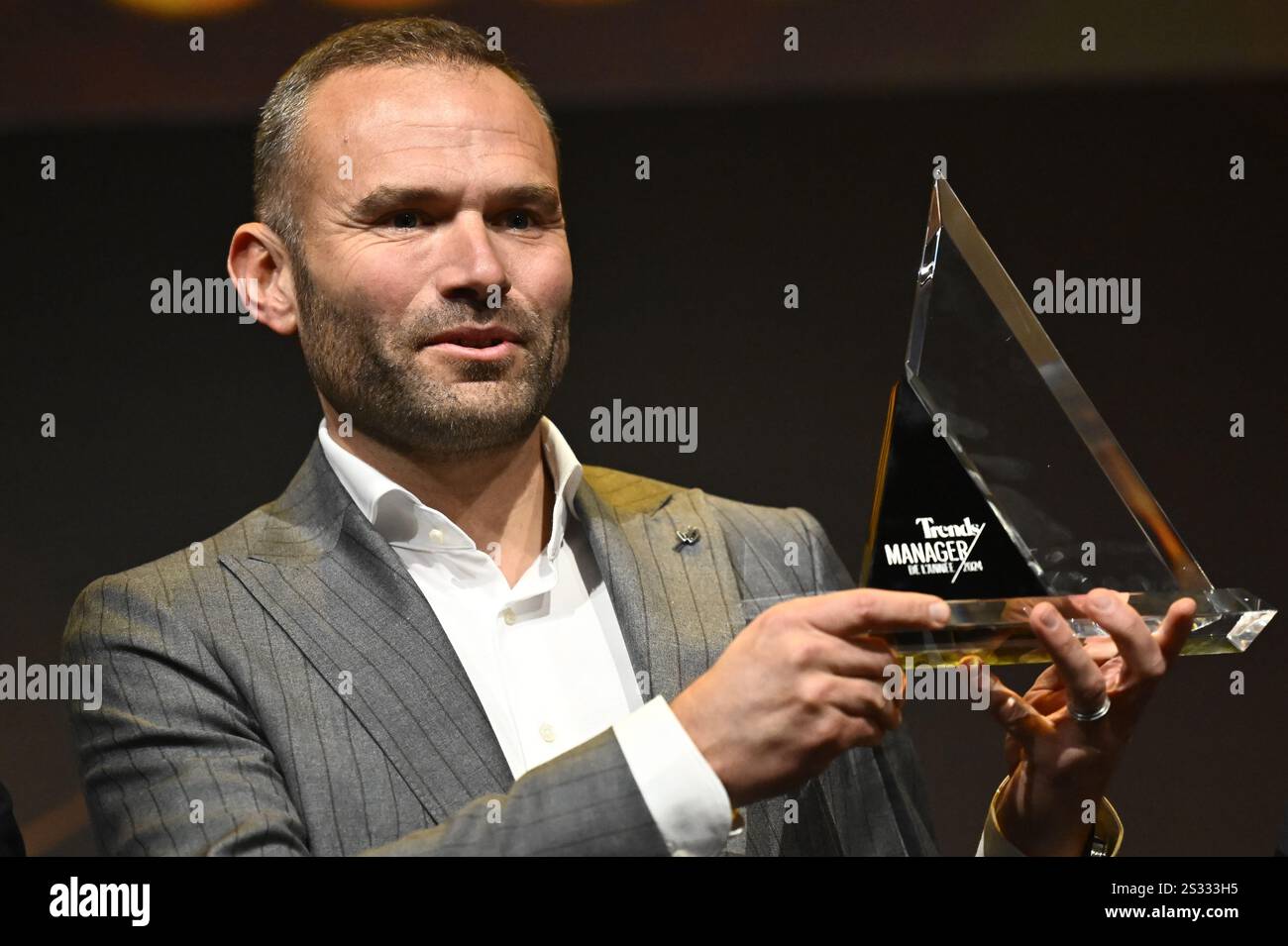 Louyet Group CEO Laurent Louyet poses with his trophy at the 40th award ...