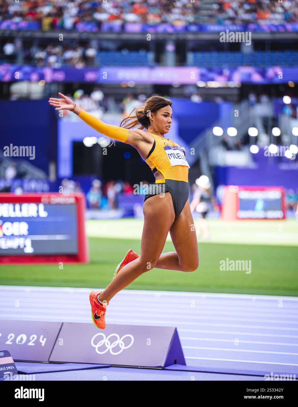 Mikaelle Assani participating in the long jump at the Paris 2024 ...