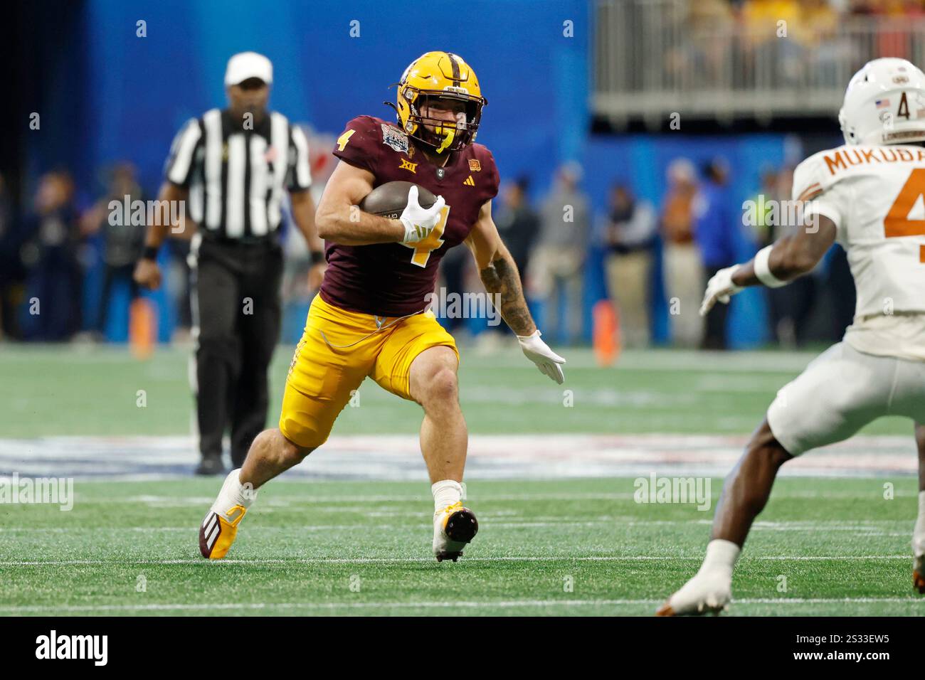 ATLANTA, GA - JANUARY 01: Running Back Cam Skattebo #4 of the Arizona ...