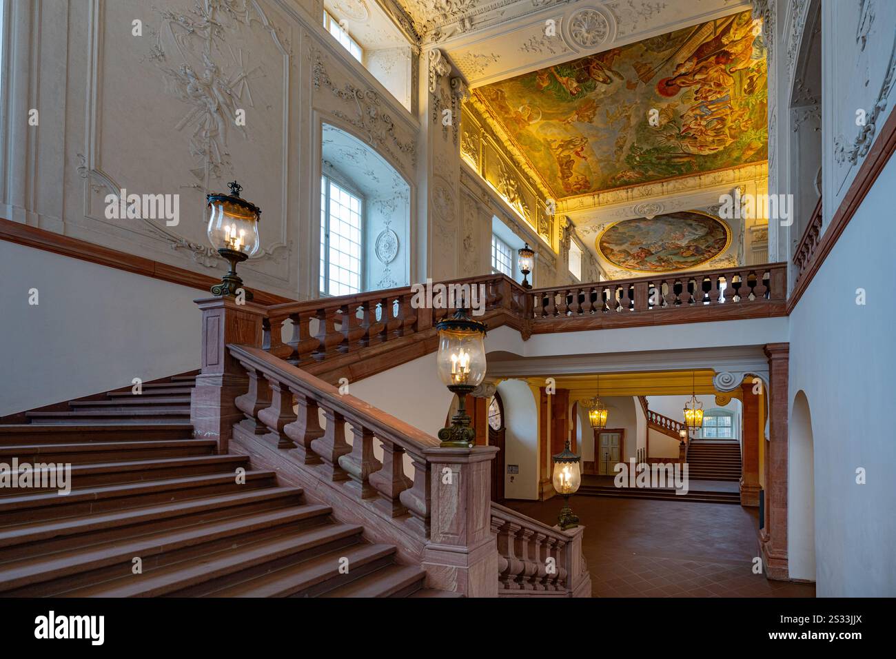 The magnificent staircase with impressive intricate stucco paintings ...
