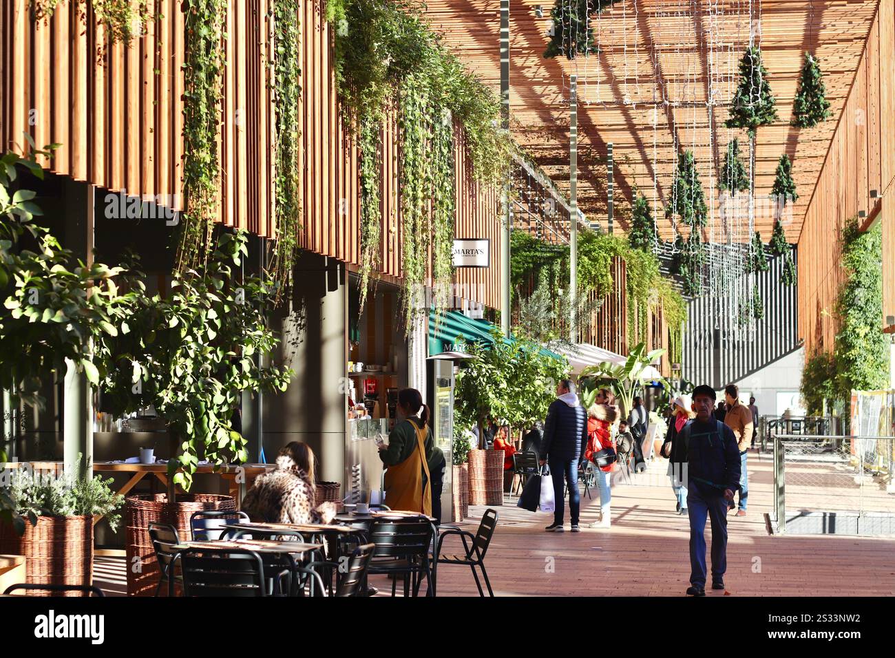 Barcelona, Spain - December 21 2024: Modern Urban Shopping Walkway with ...