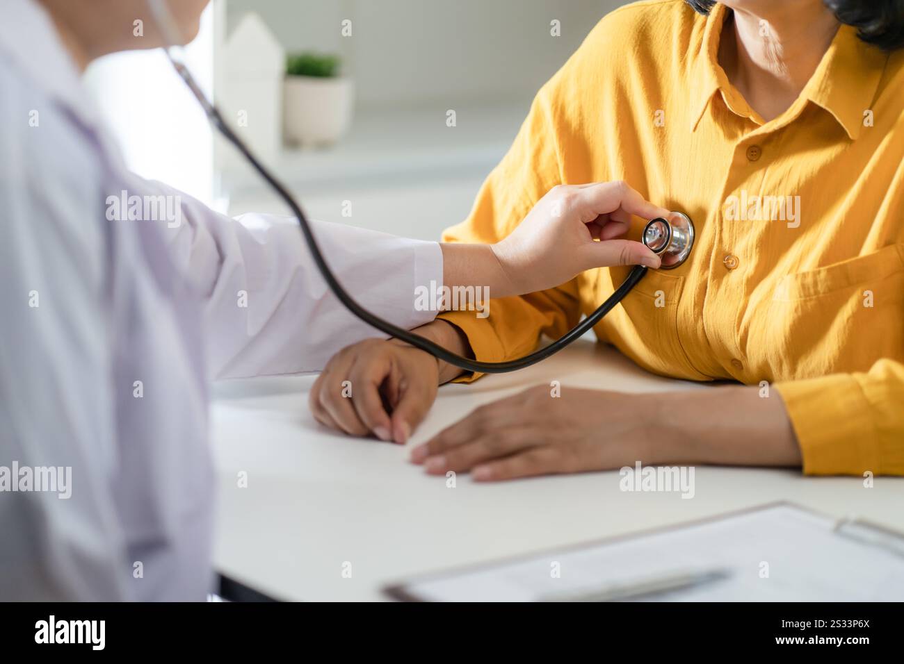 Doctor using a stethoscope checking patient stethoscope putting beat ...