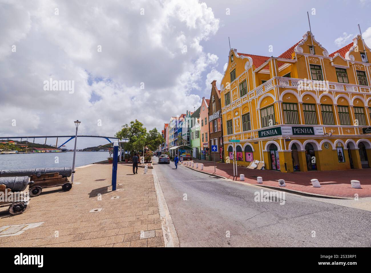 Colorful historic buildings along Trading Quay waterfront in Willemstad ...