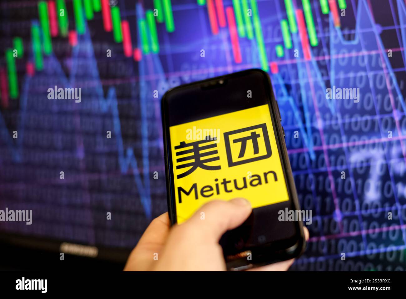 In this photo illustration, the Meituan logo, an eCommerce online ...